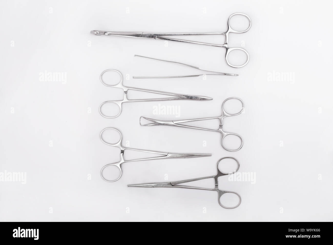 Metal surgical instruments on white background. Flat lay Stock Photo ...