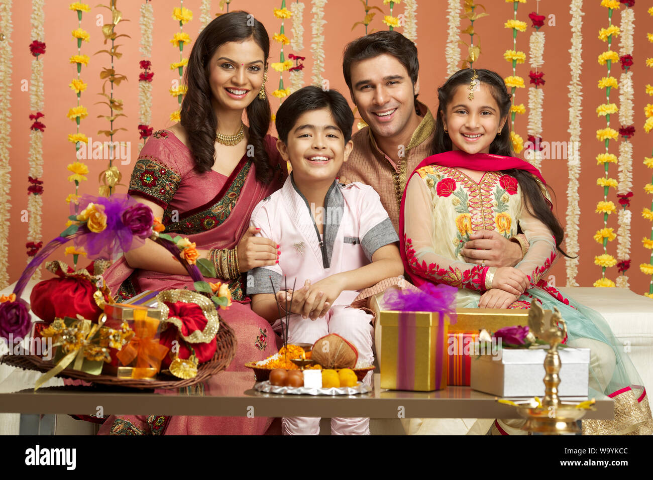 Family celebrating Diwali Stock Photo - Alamy