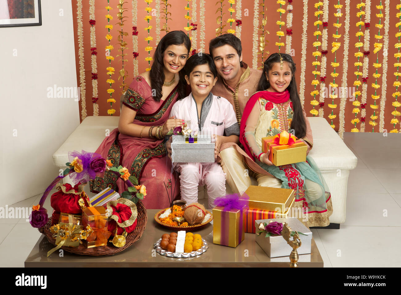 Family celebrating Diwali Stock Photo - Alamy