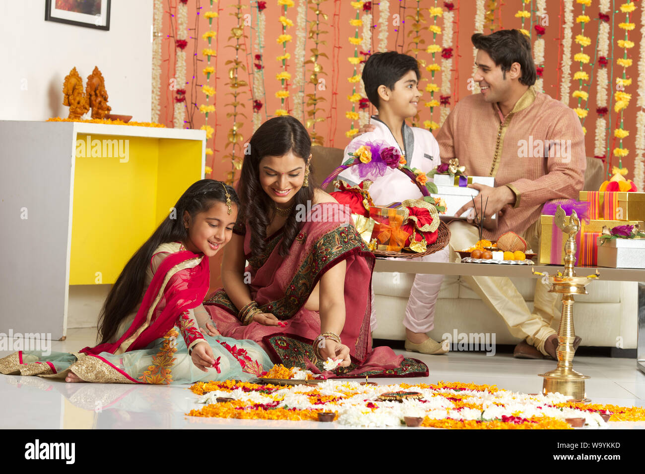 Family celebrating Diwali Stock Photo - Alamy