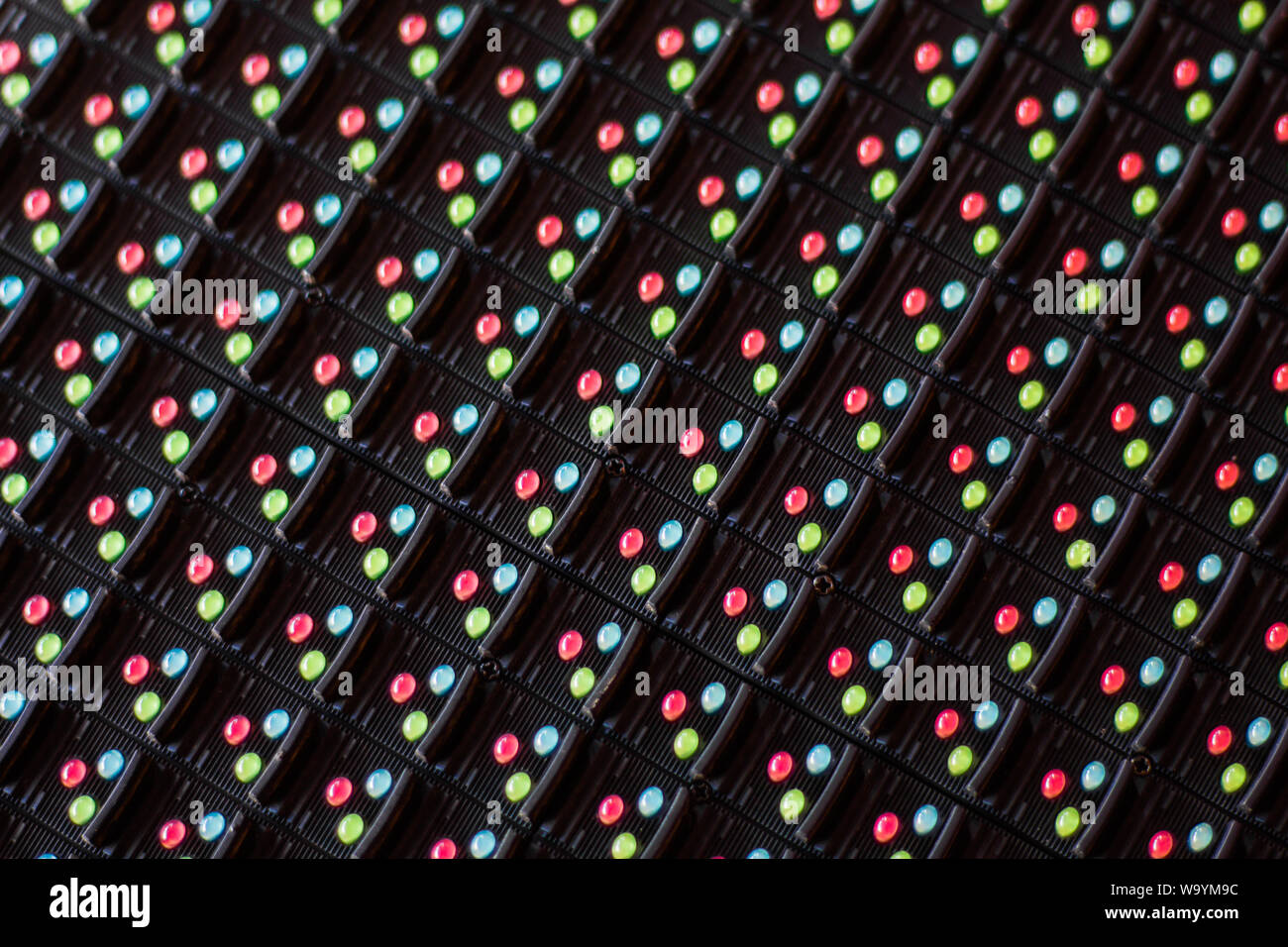 Background LED screen. Pattern LED screen. LED lamps in electronics ...