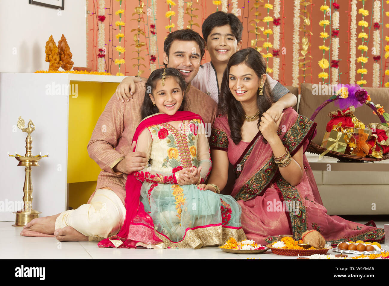Family celebrating Diwali Stock Photo - Alamy