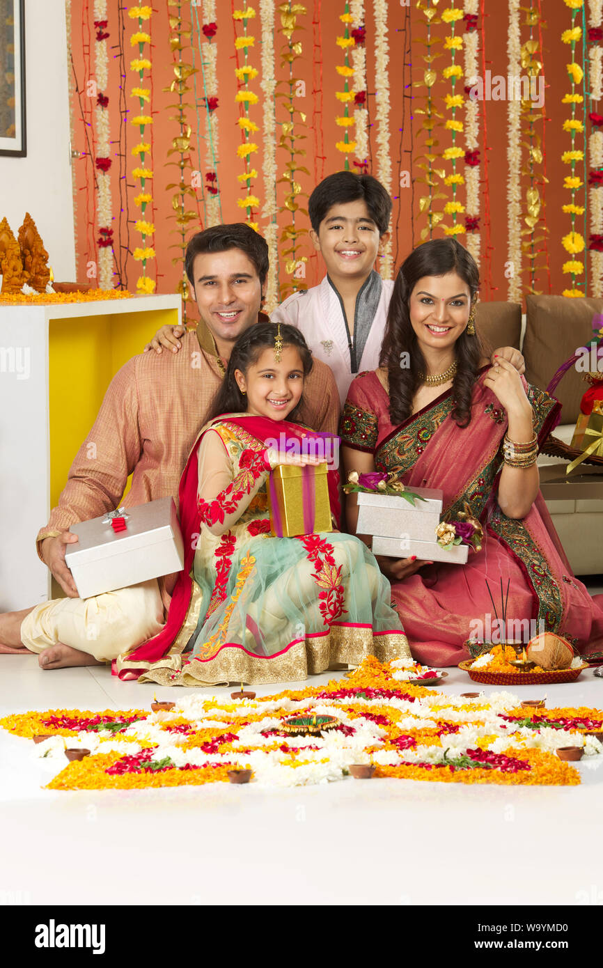 Family celebrating Diwali Stock Photo - Alamy