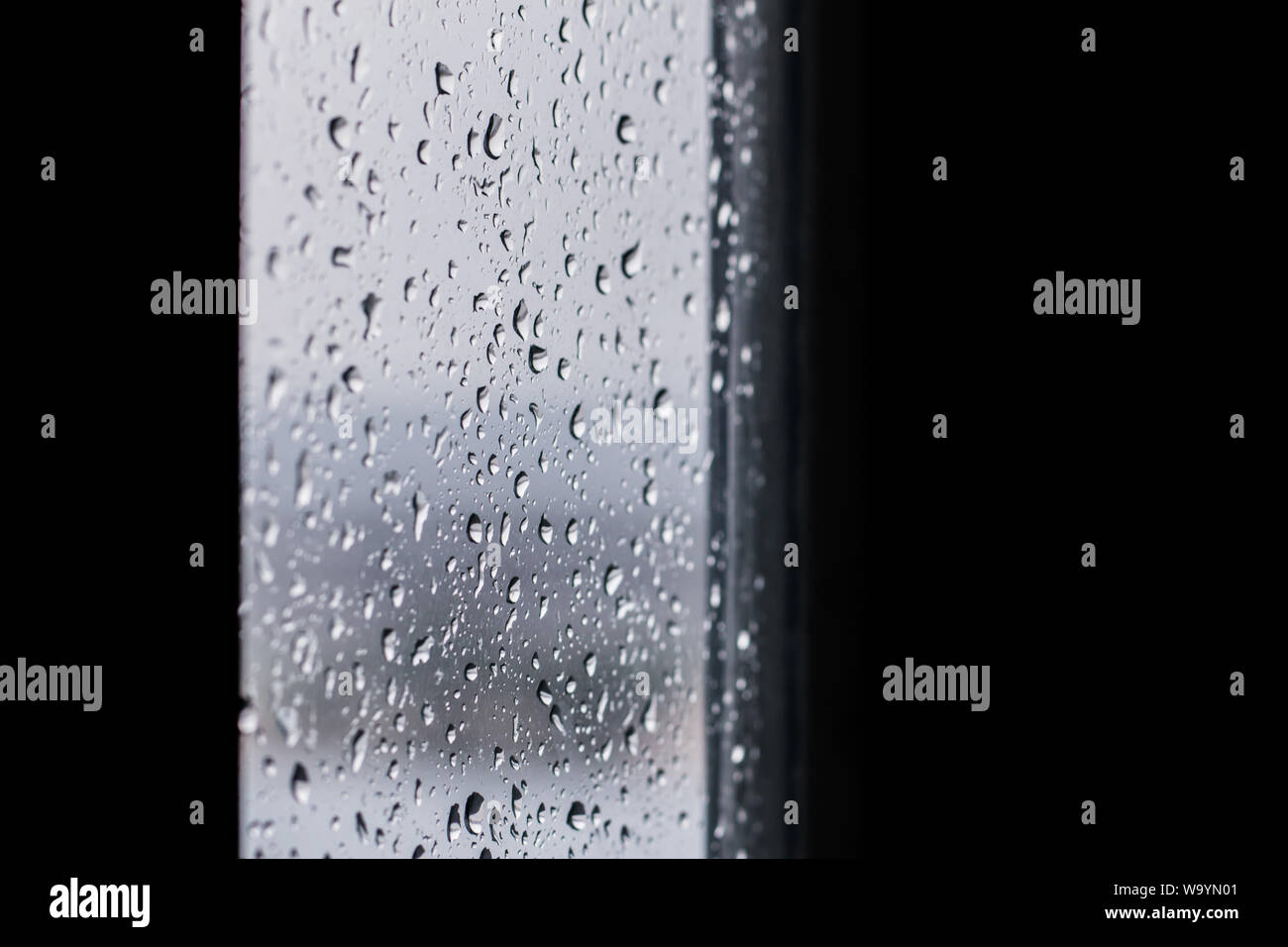 Raindrops on glass during the rainy season Stock Photo - Alamy