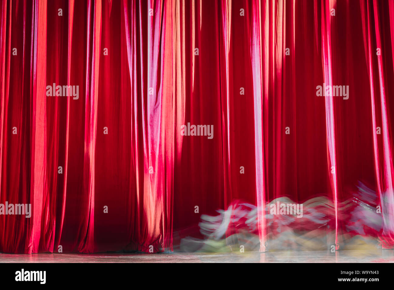 Red curtains in a theater scene of the show and motion Stock Photo - Alamy
