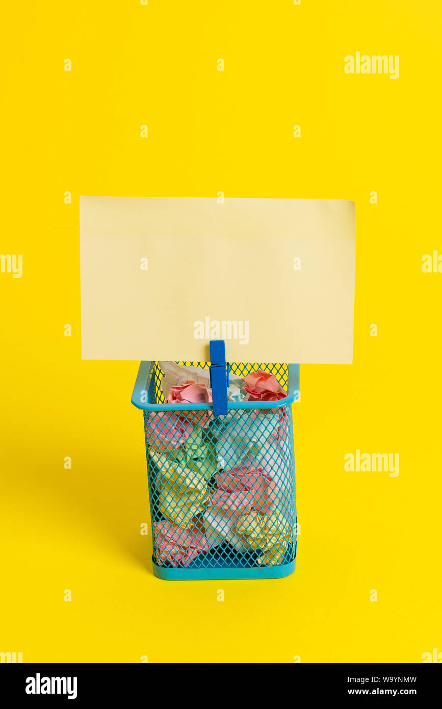 Trash bin crumpled paper clothespin empty reminder office supplies ...