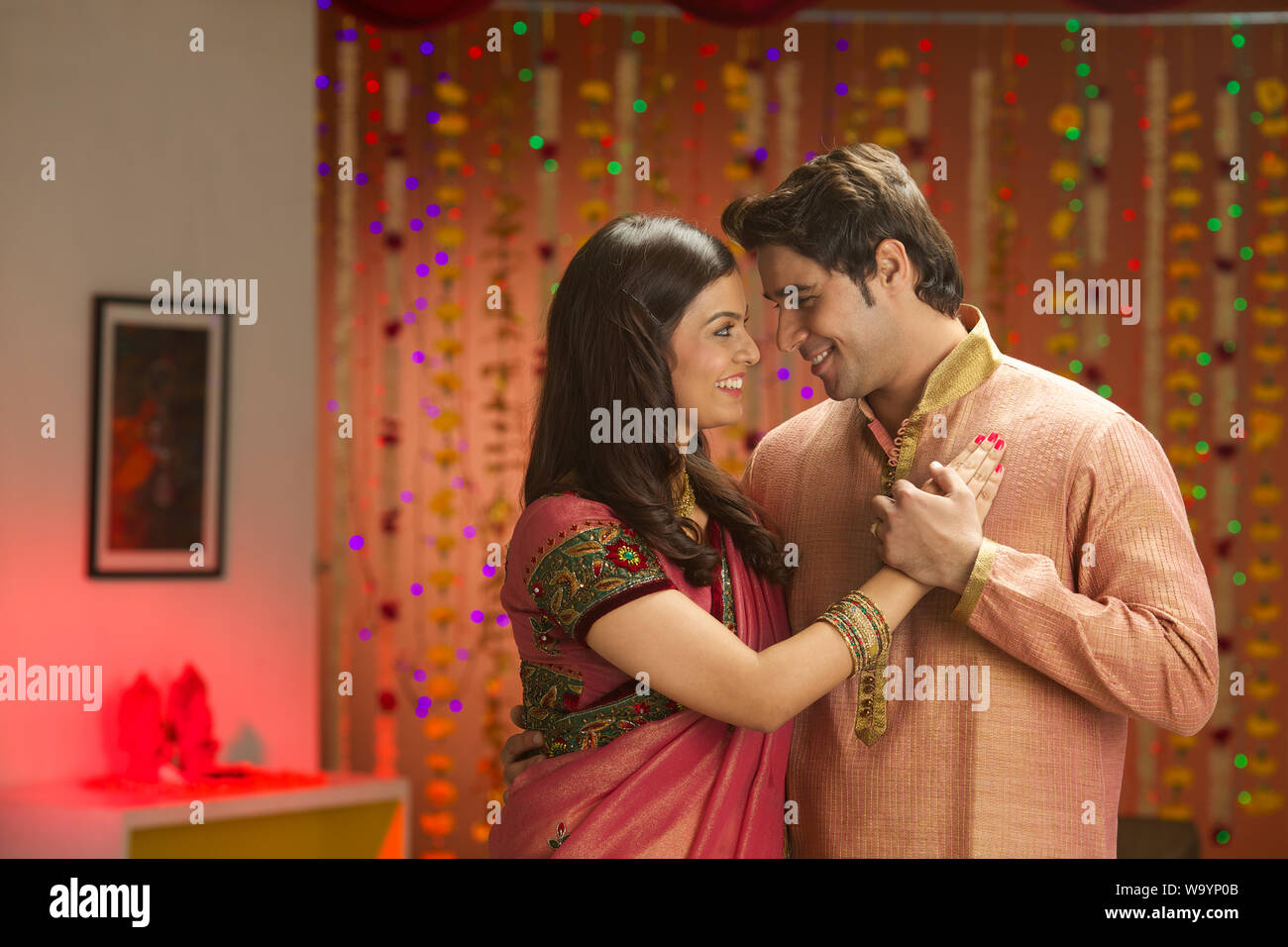 Young couple romancing Stock Photo - Alamy