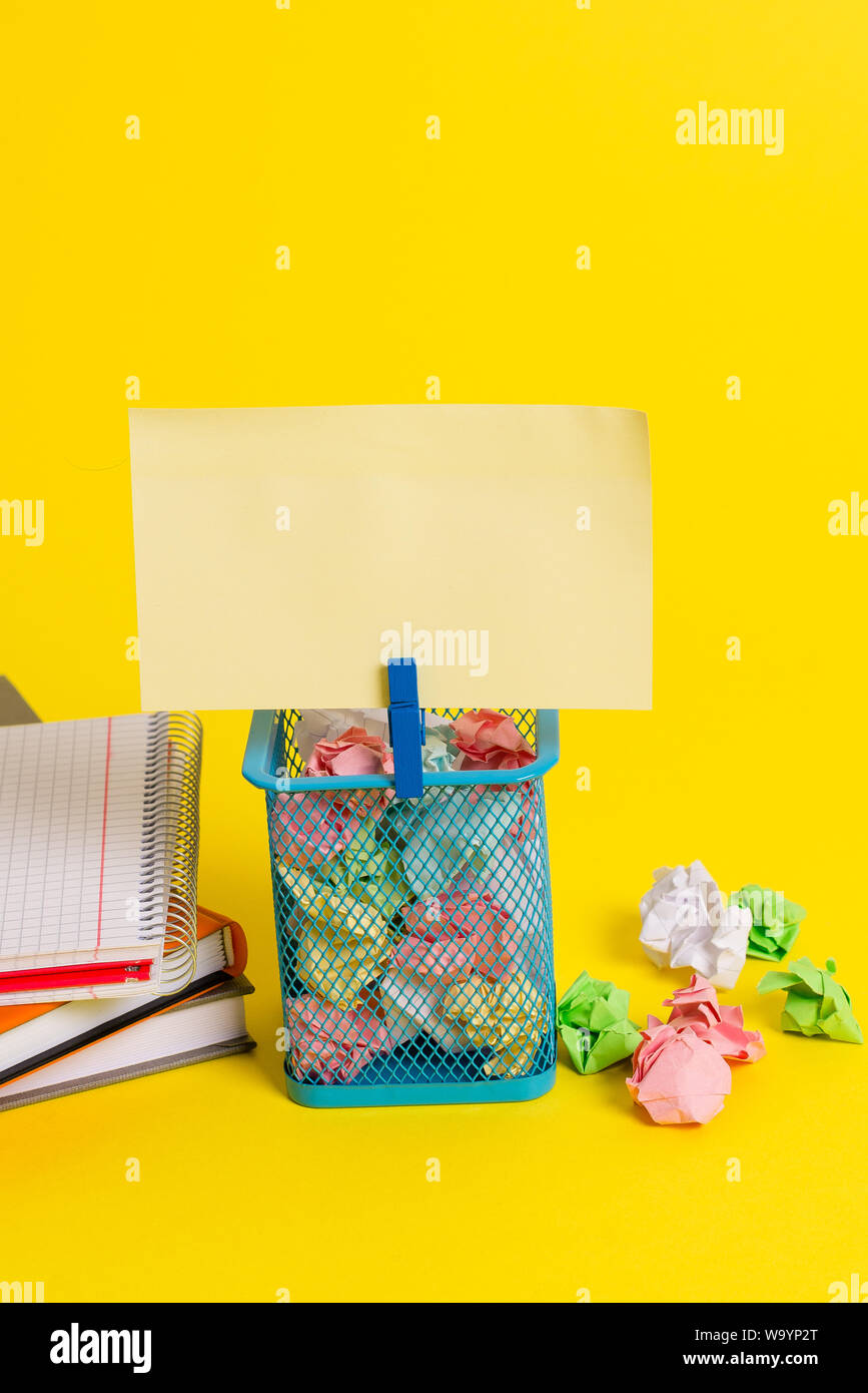 Trash bin crumpled paper clothespin empty reminder office supplies ...