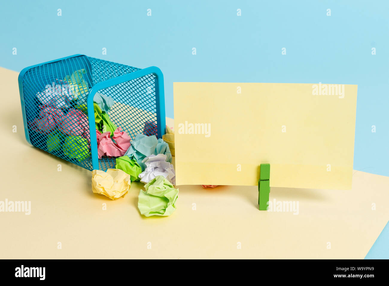 Trash bin crumpled paper clothespin empty reminder office supplies ...
