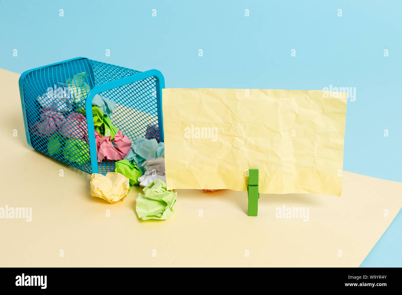 Trash bin crumpled paper clothespin empty reminder office supplies ...
