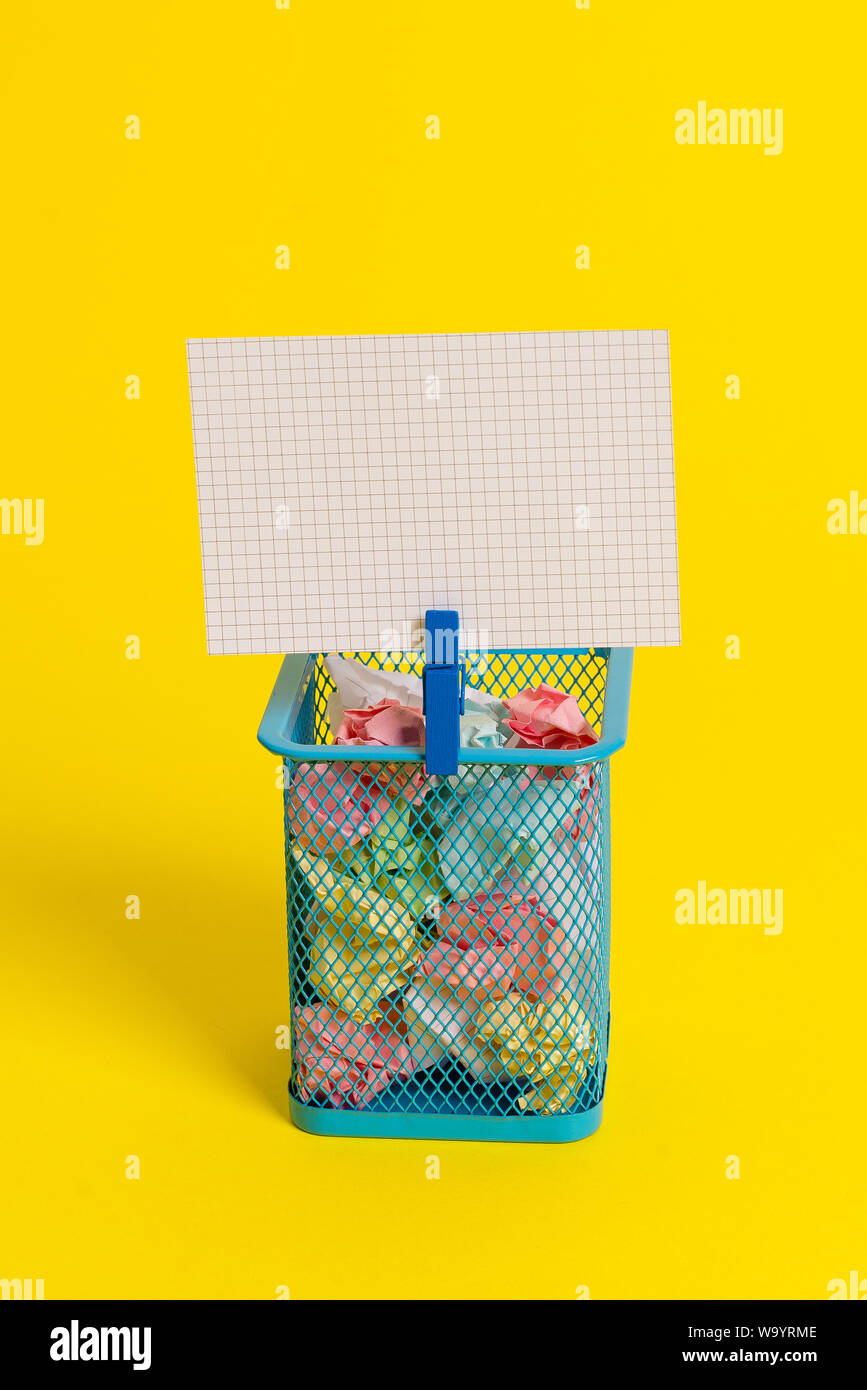 Trash bin crumpled paper clothespin empty reminder office supplies ...