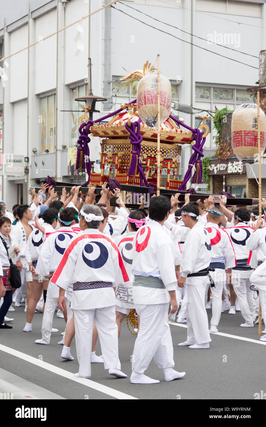 chiba, japan, 08/16/2019 , Japanese people transporting the portable ...