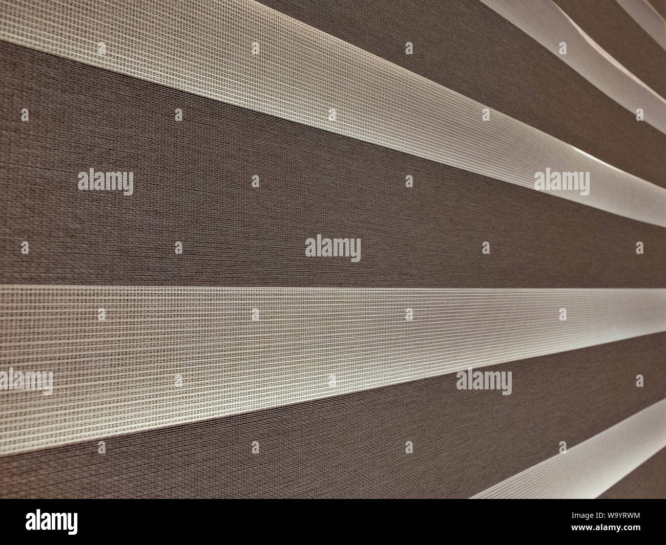 Horizontal striped curtains made from natural material Stock Photo - Alamy