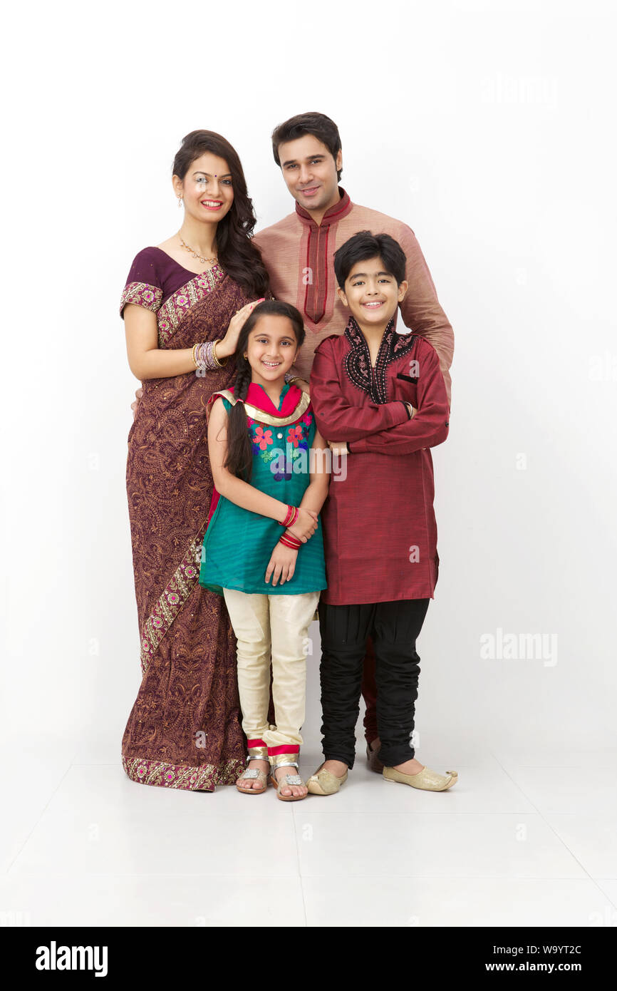 Family standing together Stock Photo - Alamy