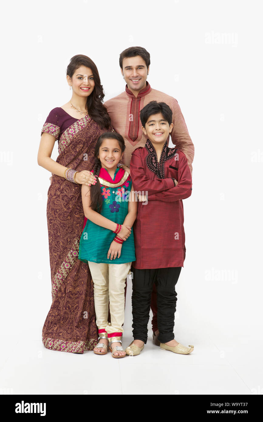 Family standing together Stock Photo - Alamy