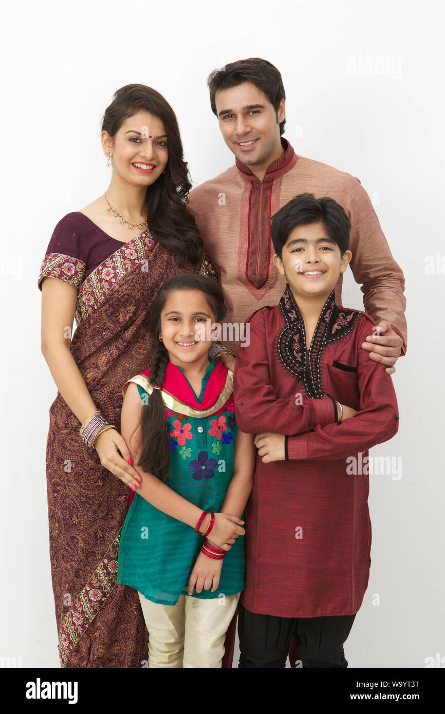 Family standing together Stock Photo - Alamy