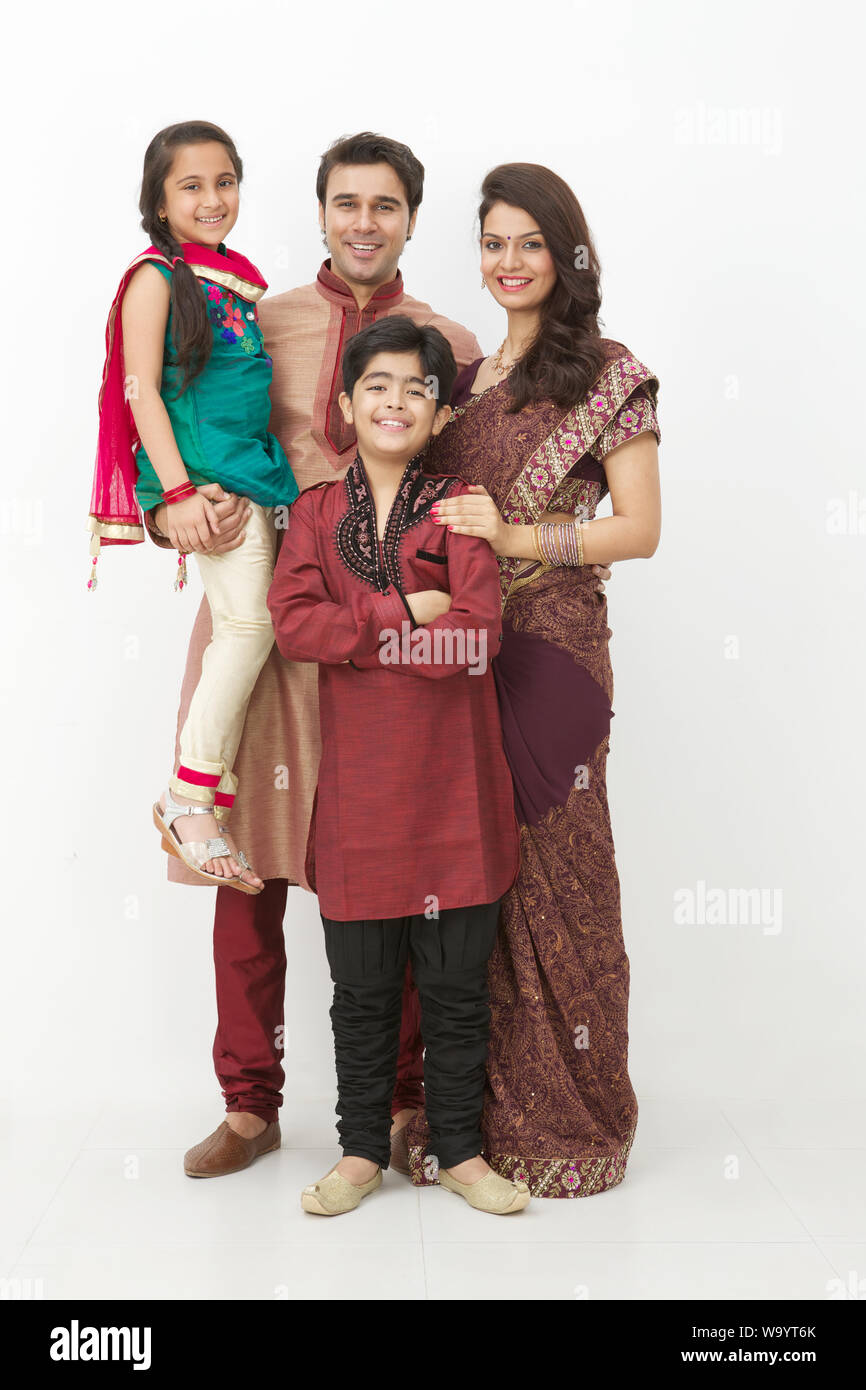 Family standing together Stock Photo - Alamy
