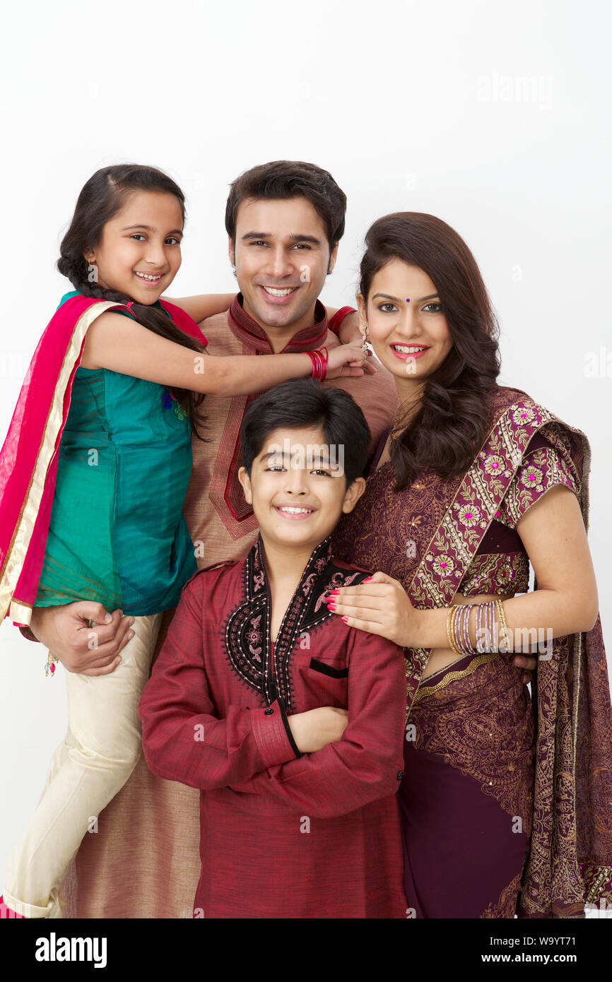 Family standing together Stock Photo - Alamy