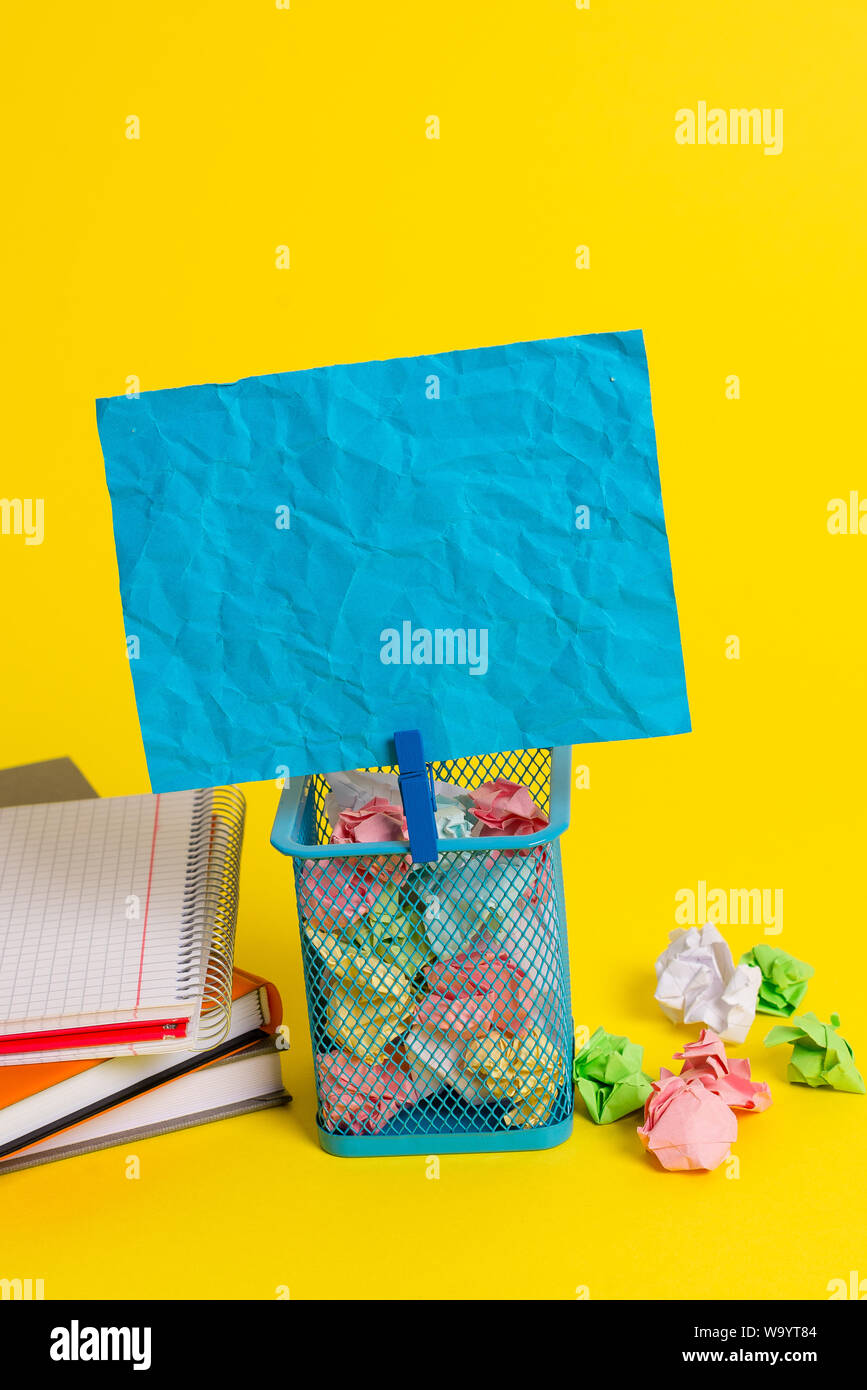 Trash bin crumpled paper clothespin empty reminder office supplies ...