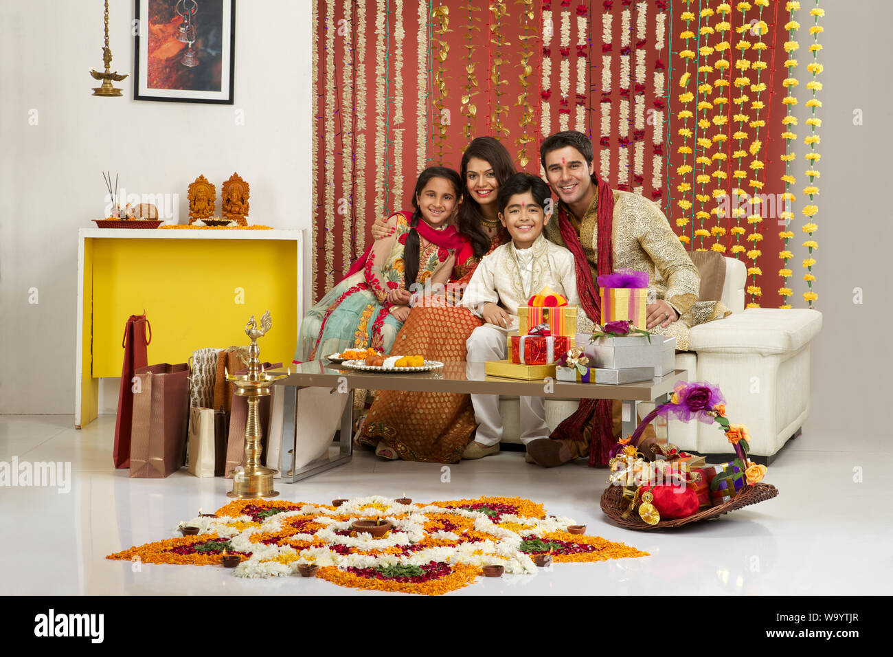 Indian family celebrating diwali festival hi-res stock photography and ...
