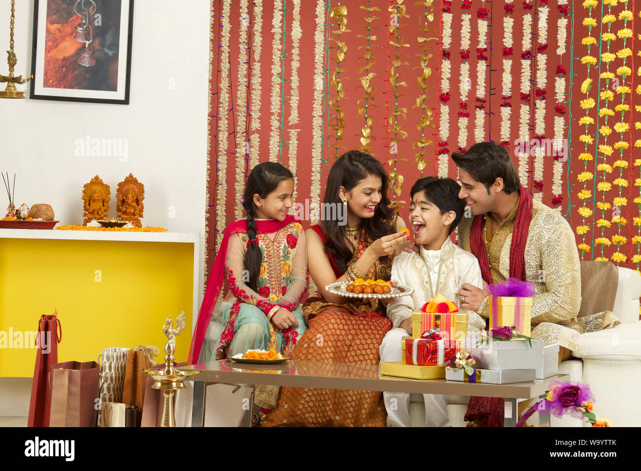 Family celebrating Diwali Stock Photo - Alamy