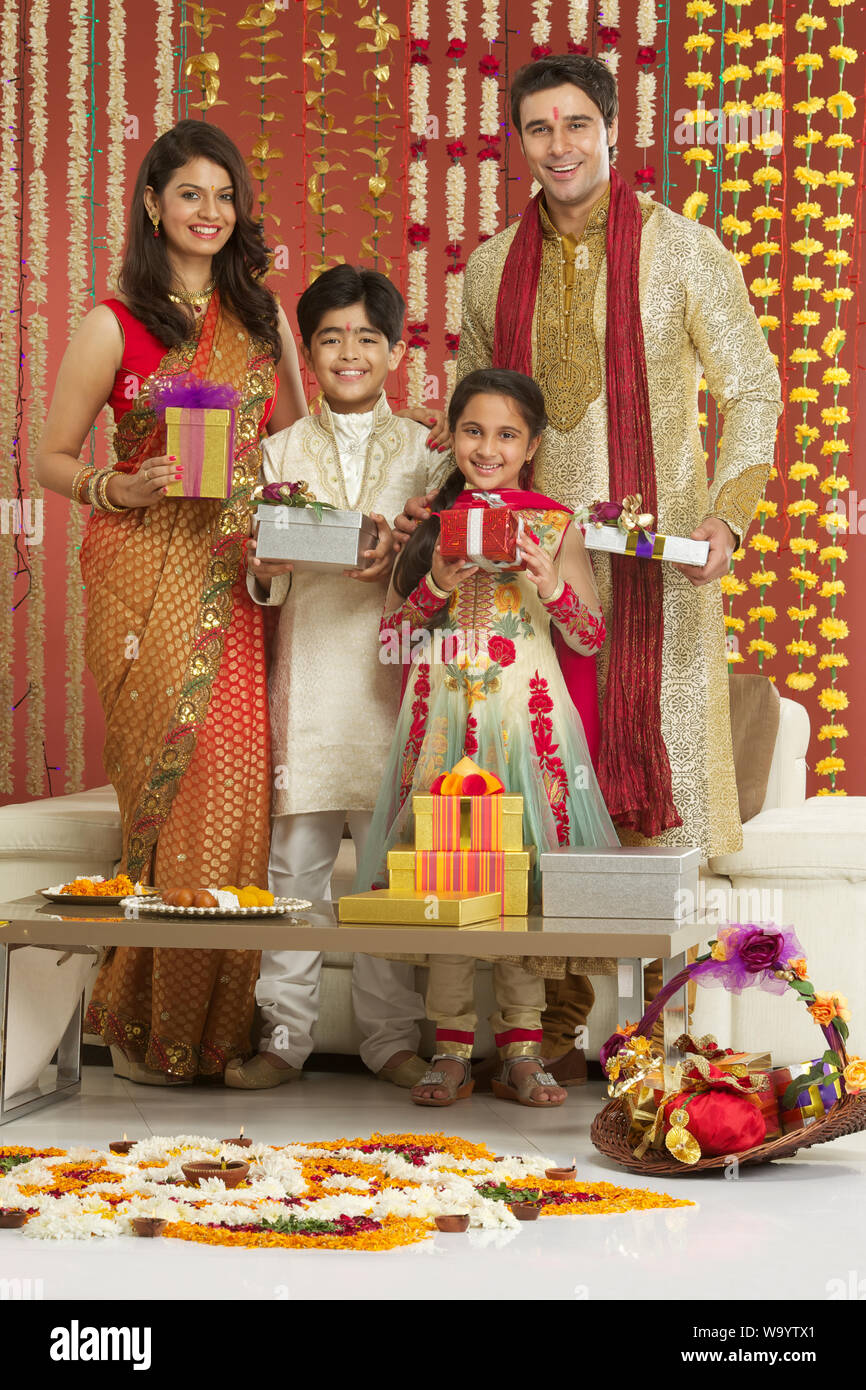 Family celebrating Diwali Stock Photo - Alamy