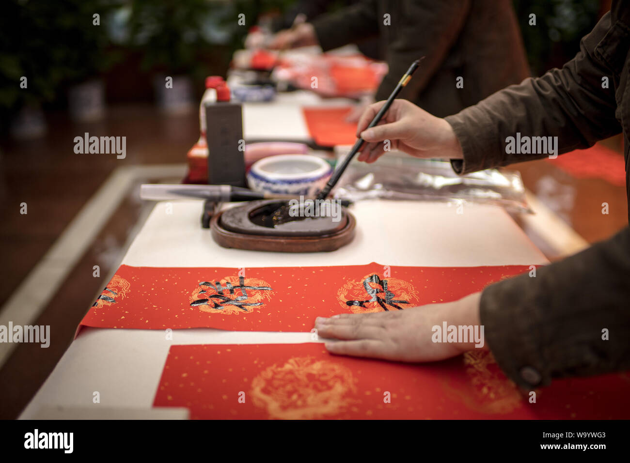 Write Spring Festival couplets Stock Photo - Alamy