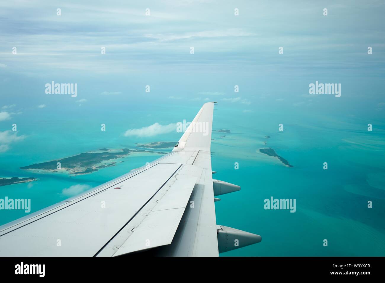 Airplane wing in water hi-res stock photography and images - Alamy