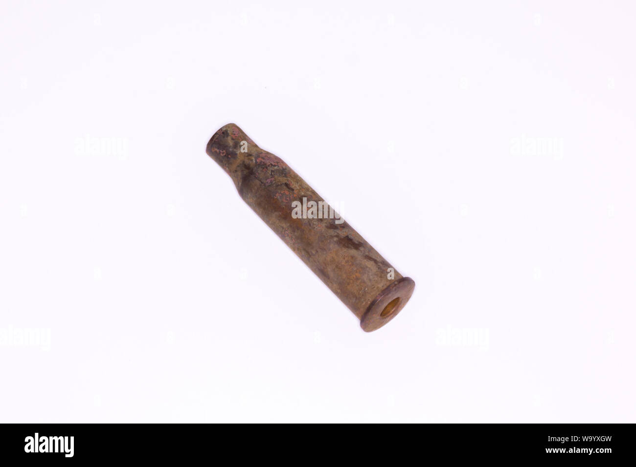 Old used rusty peeled cartridge case isolated on white background Stock ...