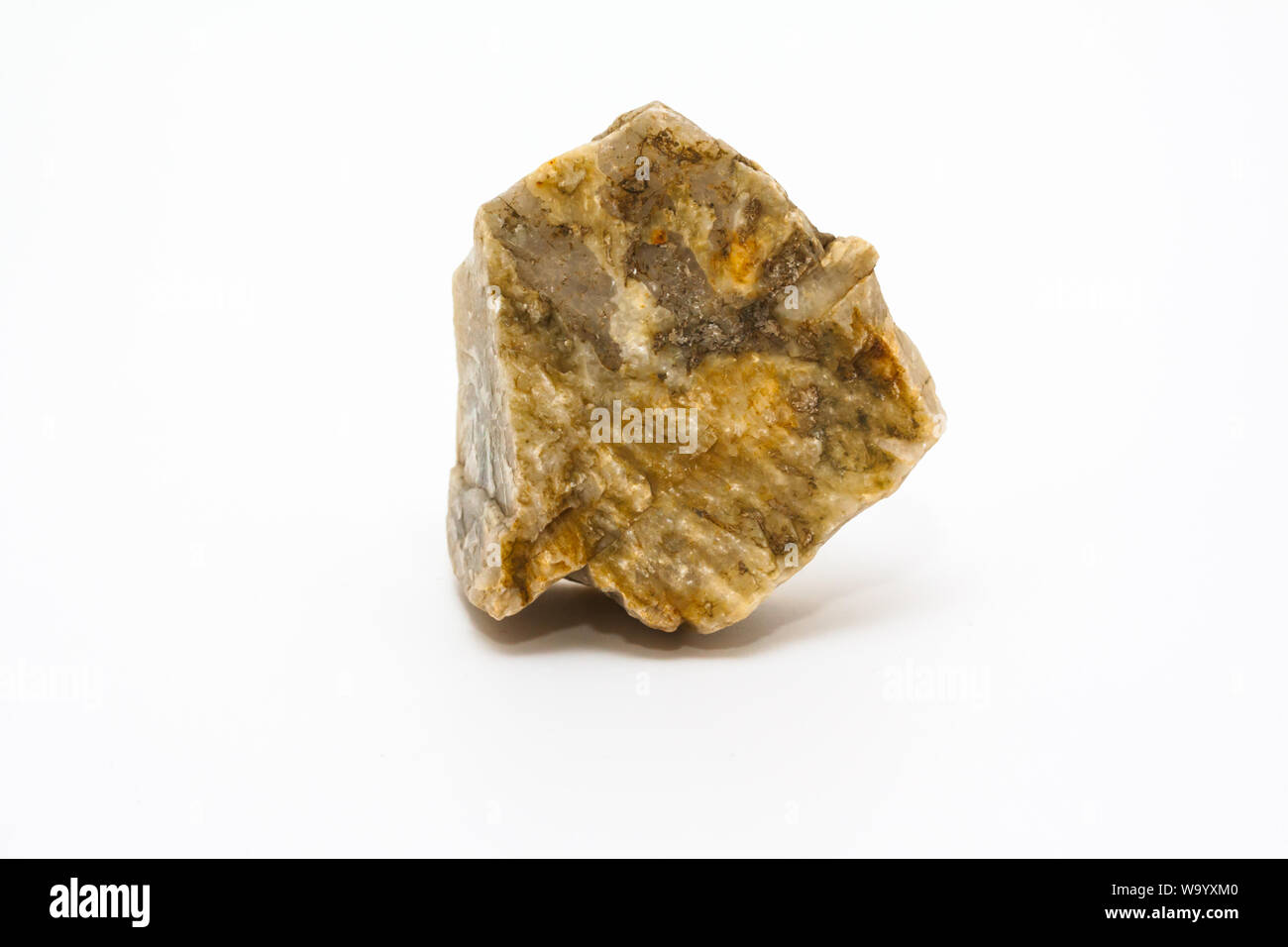 Natural brown stone isolated on white background Stock Photo - Alamy