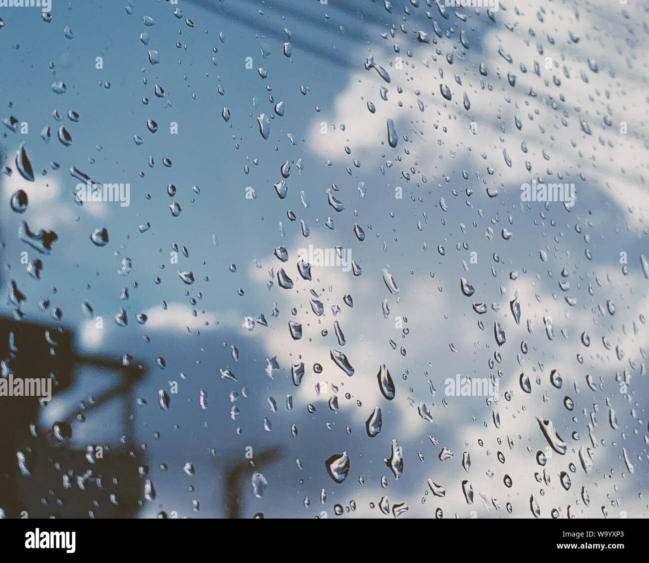 Closeup shot of raindrops on a glass window Stock Photo - Alamy