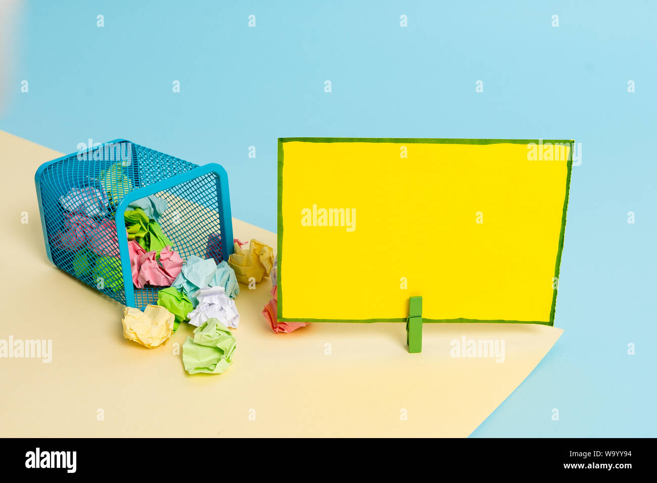 Trash bin crumpled paper clothespin empty reminder office supplies ...