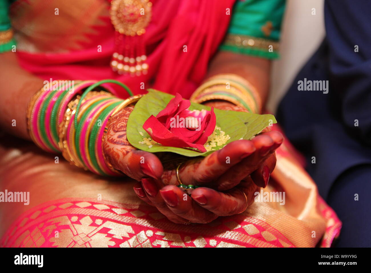 Indian bride doing rituals hi-res stock photography and images - Alamy