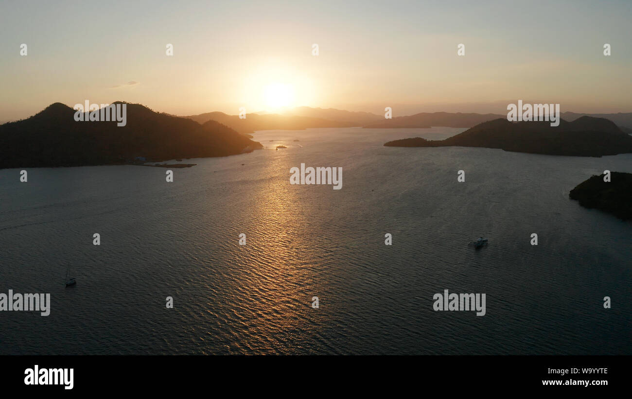 aerial view sunset over the sea with islands. Philippine Islands in the ...