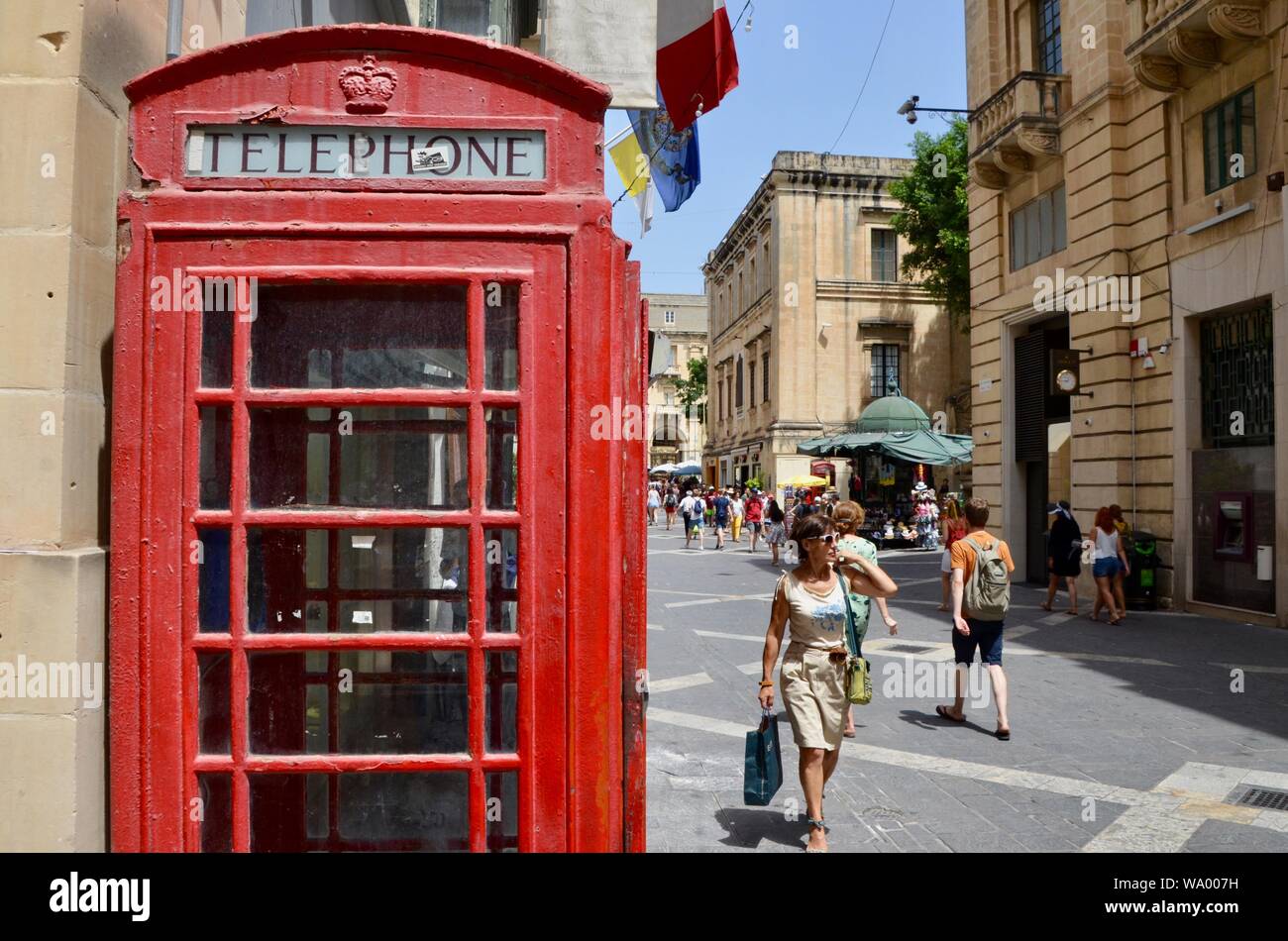 british red telephone box kiosk on republic street valletta malta Stock ...