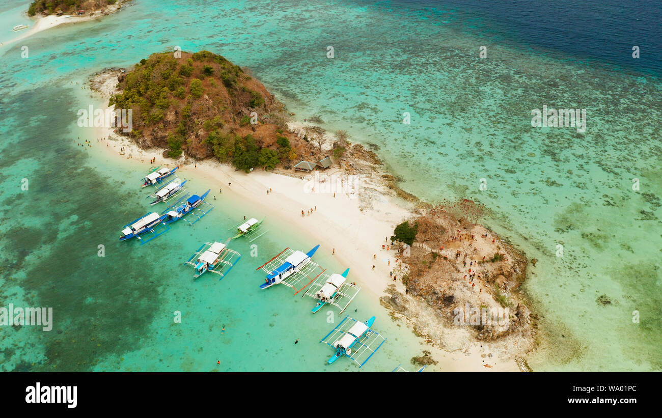 aerial view tropical island with sand white beach. Bulog Dos ...