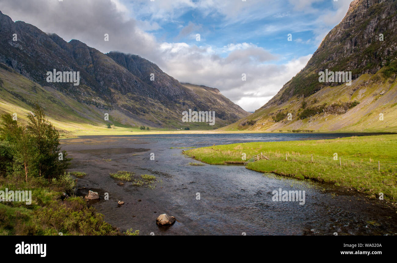The River Coe forms a small lake, Loch Achtriochtan, on the valley ...