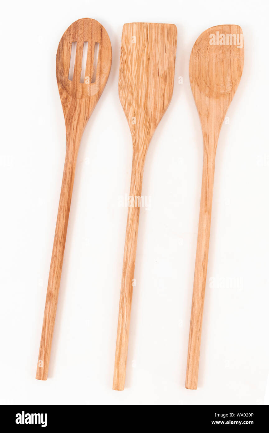Top view of three wooden ladles on a white background. Close-up Stock ...