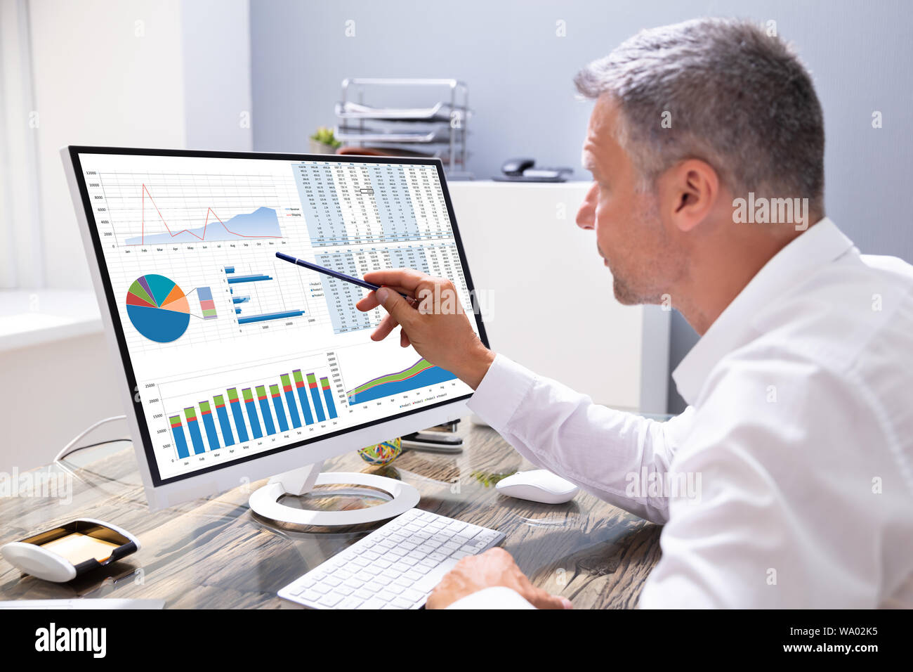 Computer desktop graphs keyboard hi-res stock photography and images ...