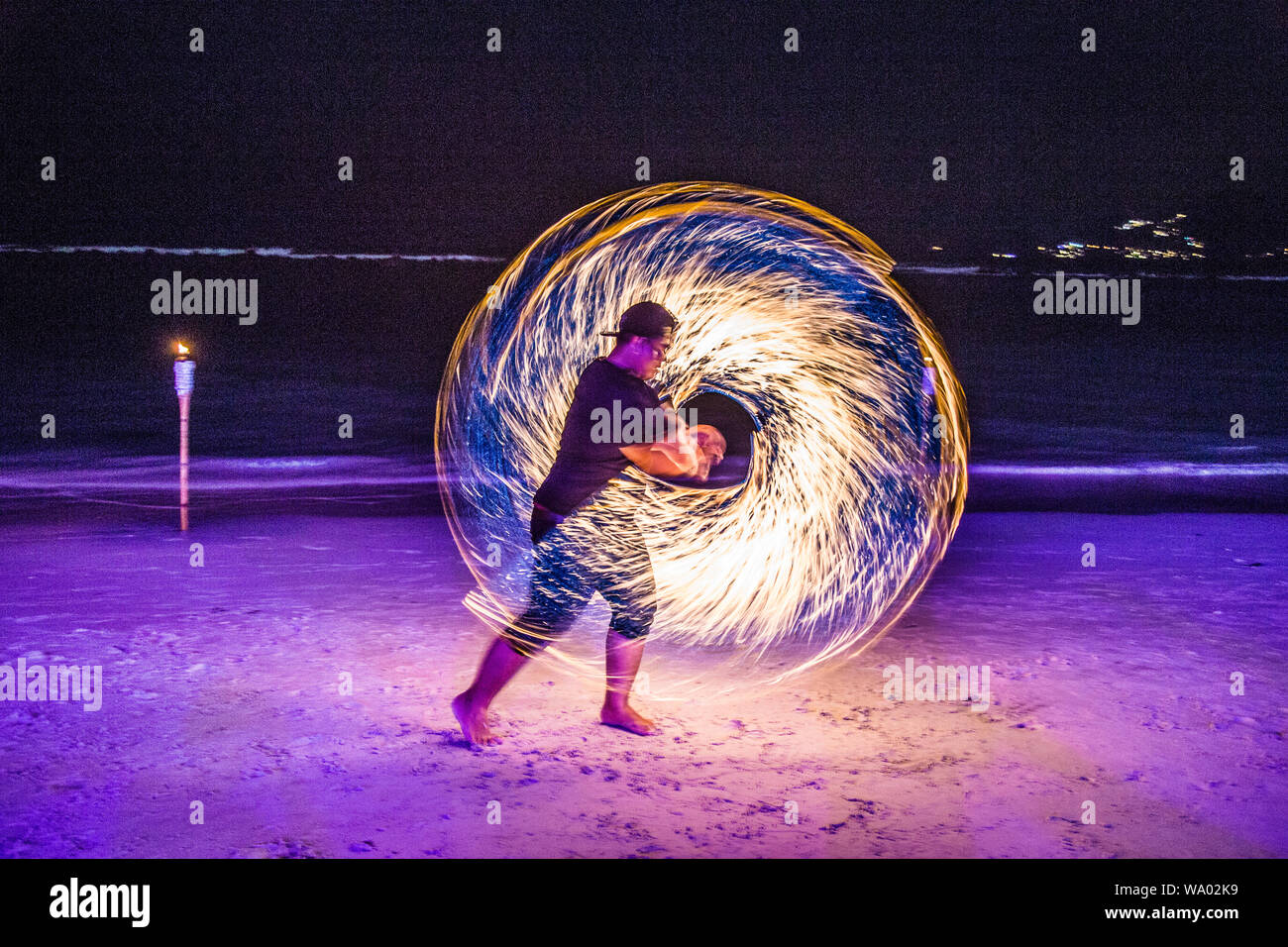 Fire show on the beach in Koh Samui in Thailand Stock Photo - Alamy