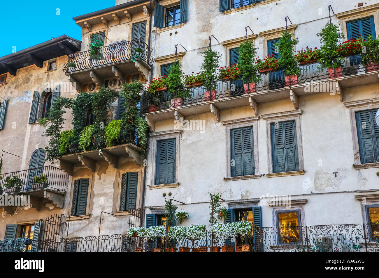 windows in the facades of ancient Venetian houses Stock Photo - Alamy