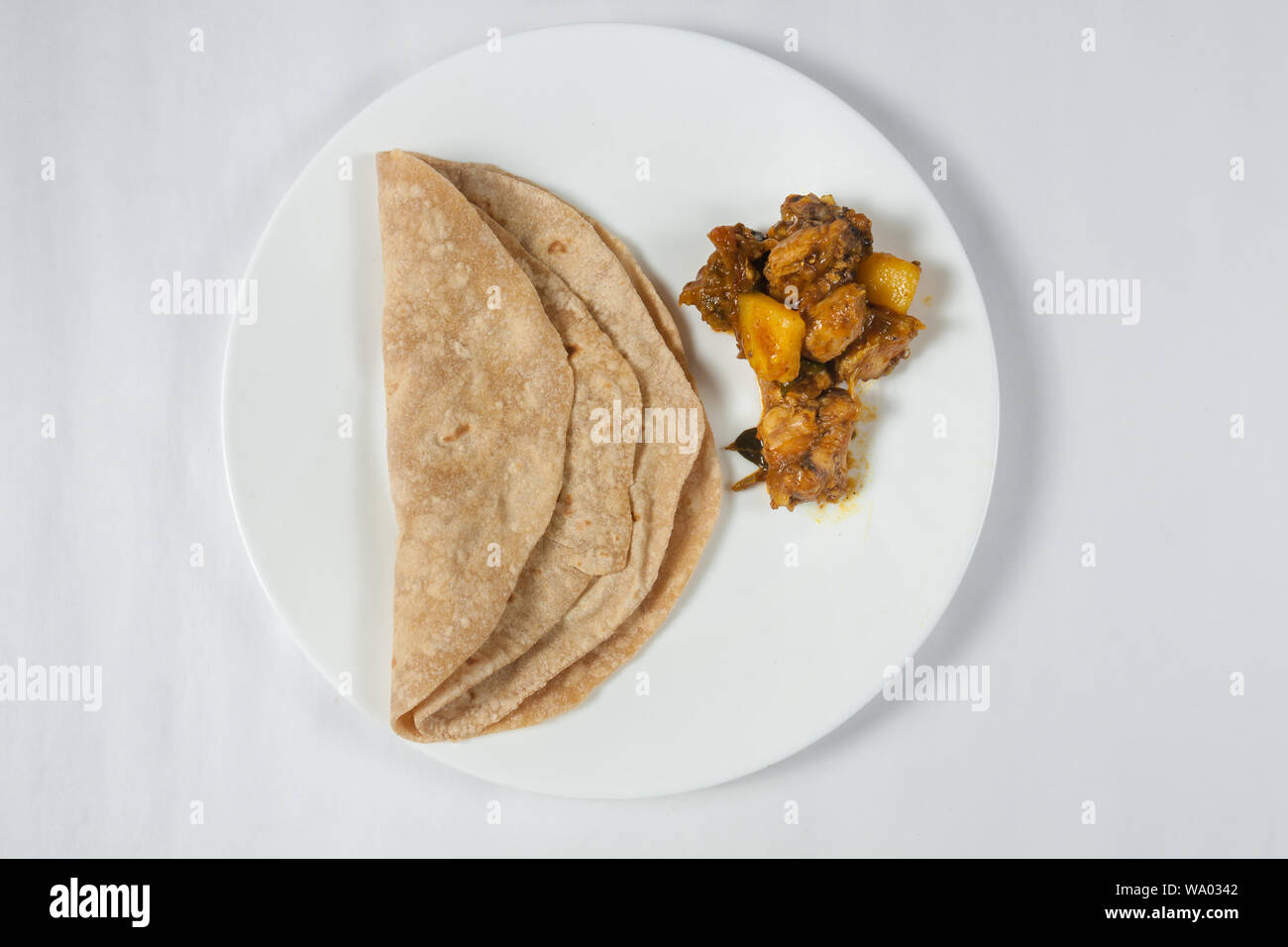 Chapati with curry hi-res stock photography and images - Alamy