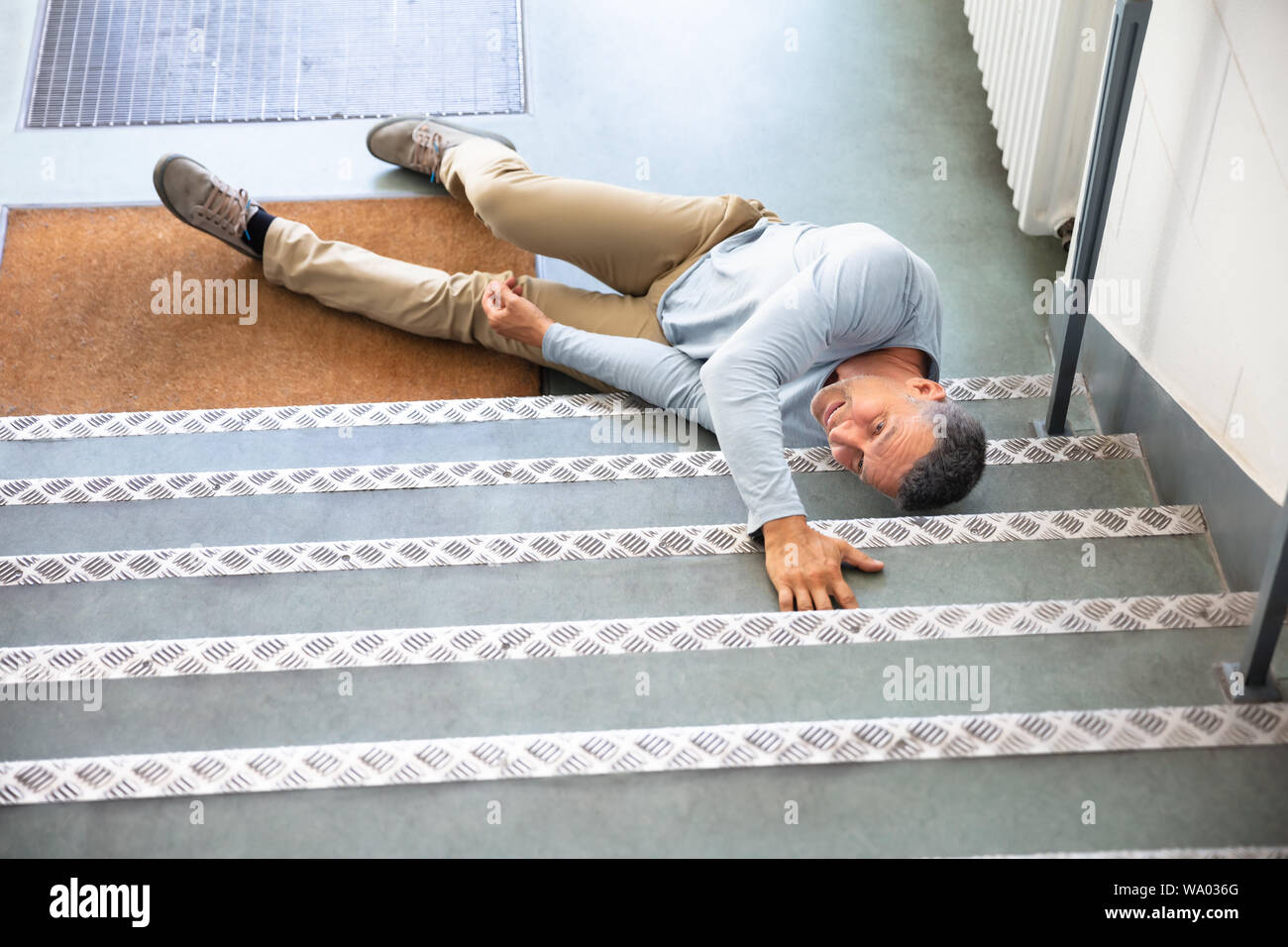 Man Falling Down Stairs Home High Resolution Stock Photography and ...