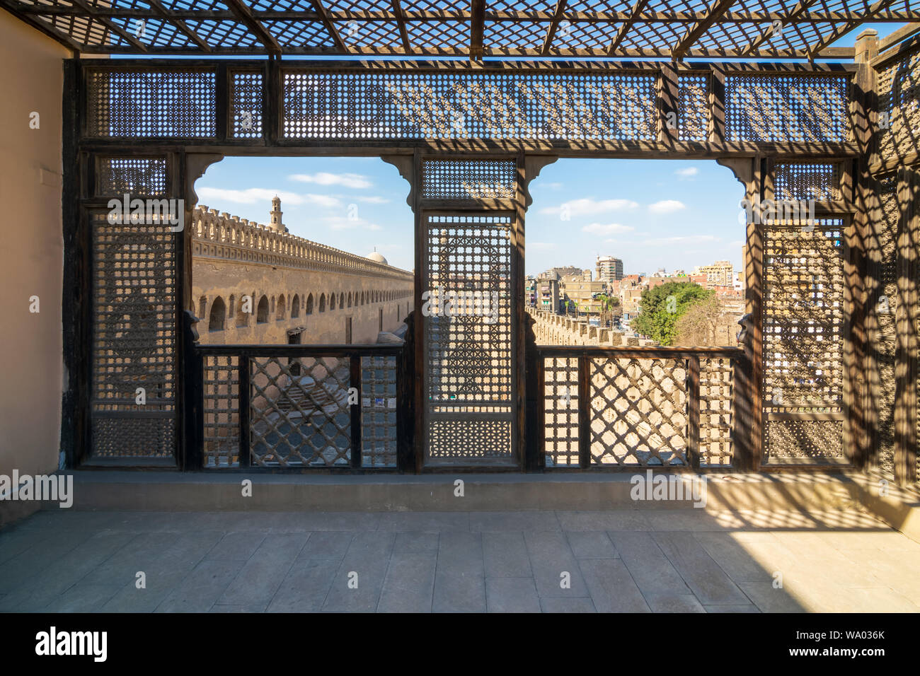 Passage surrounding the Mosque of Ibn Tulun framed by interleaved ...