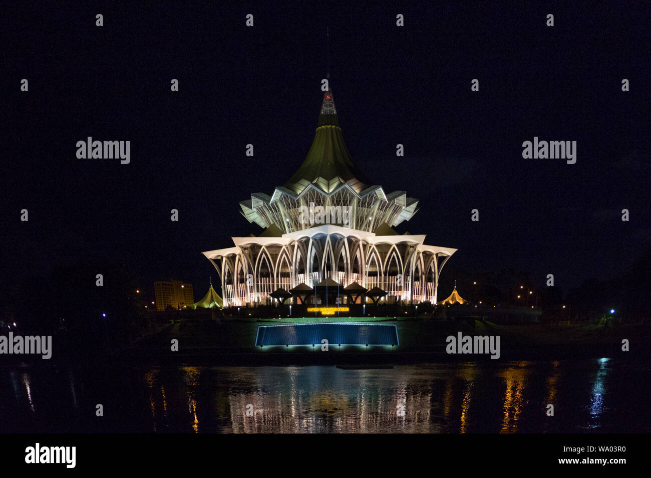 The beautiful, modern Legislative Assembly building at night in Kuching ...