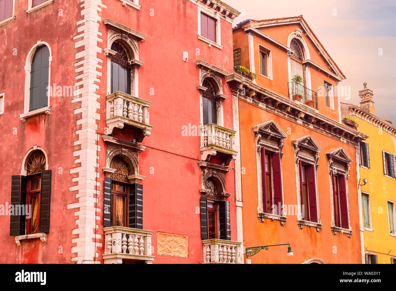 Venice, Italy colorful houses street view during sunset Stock Photo - Alamy