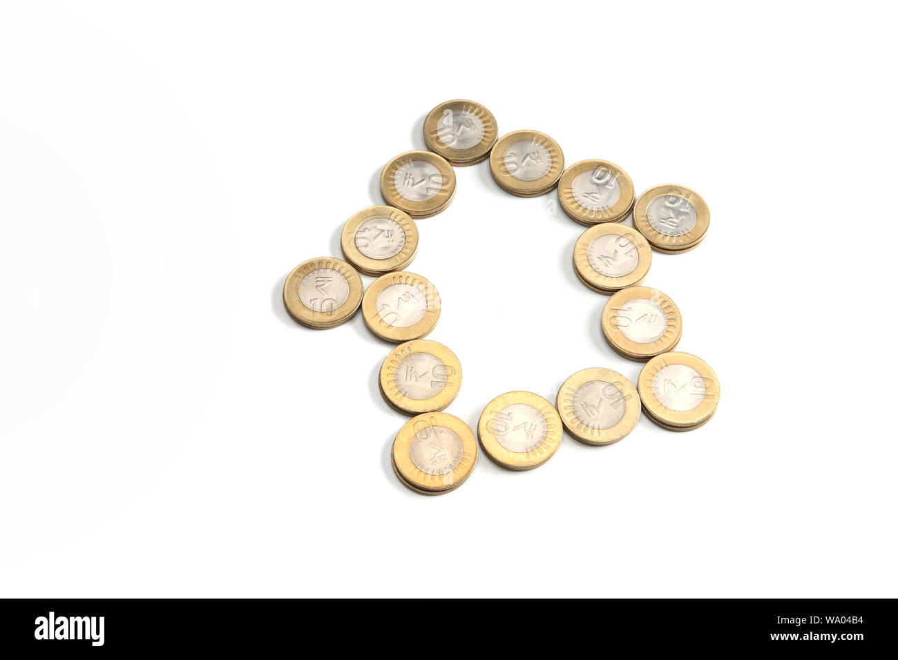 Coins forming the shape of a house Stock Photo - Alamy