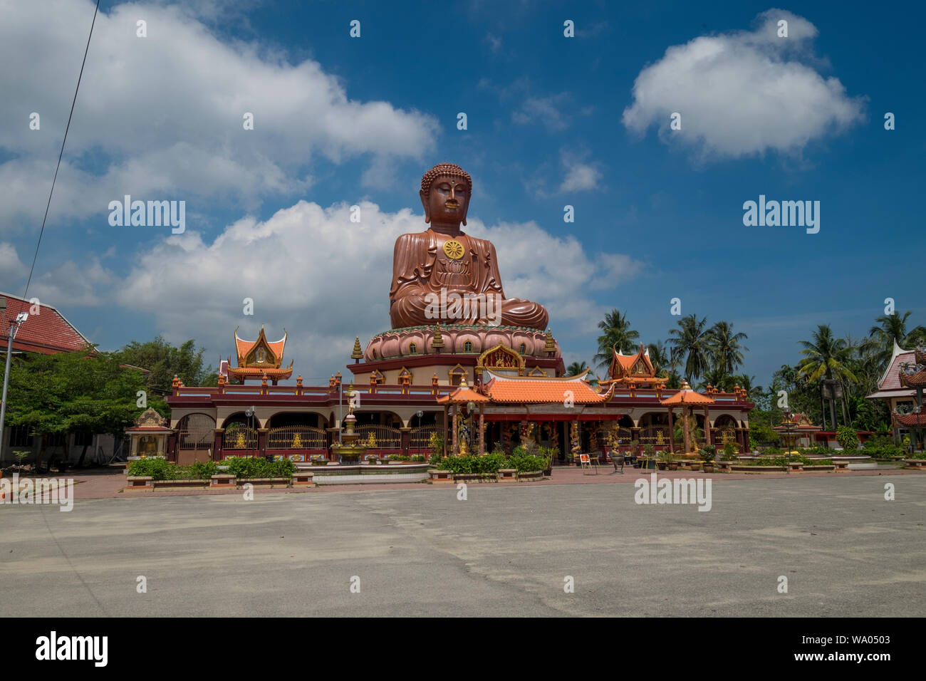 Wat Machimmaram, with a large, sitting Buddha in Tumpat, Malaysia Stock ...