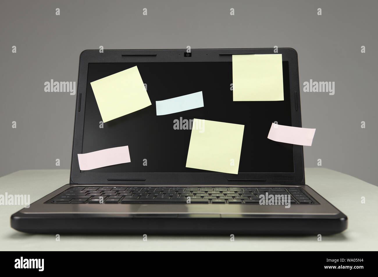 Adhesive notes stuck on a laptop Stock Photo - Alamy