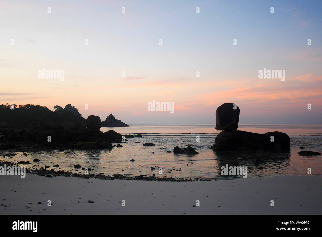 Idyllic sunrise over Boulder Bay, the main beach on Boulder Island ...